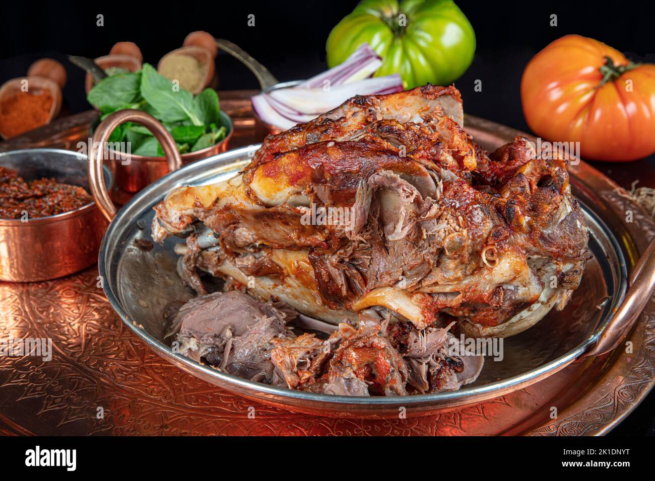 Roasting head of a lamb. Traditional Turkish Offal Food Kelle Sogus ...