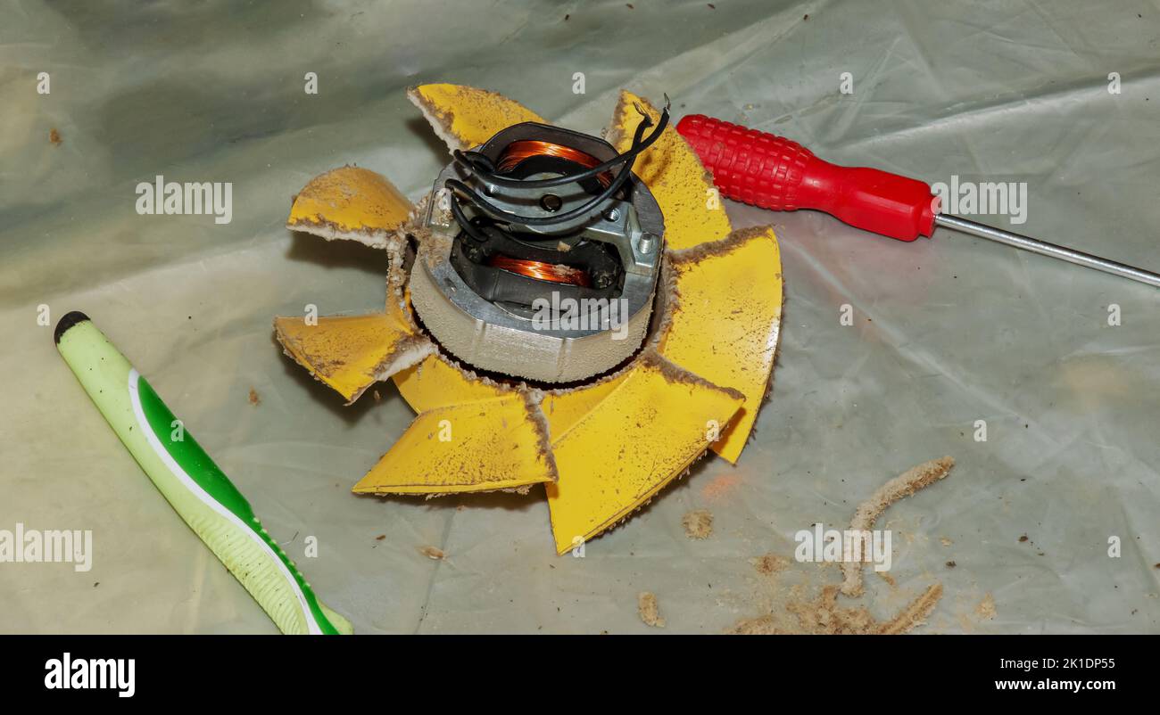 Close-up of a very dirty kitchen exhaust fan. Fan before preventive ...