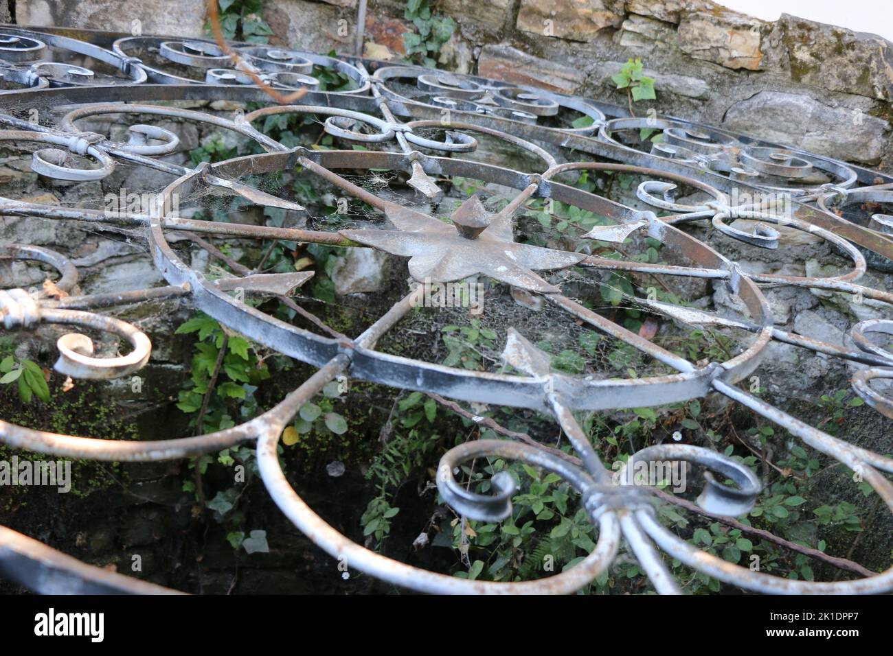 Well cover with an ornate pattern protects an old well in Monterey, CA ...