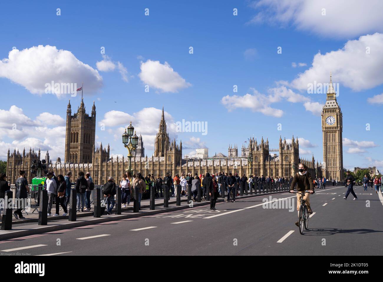 people joining the queues along the south bank of the River Thames to ...