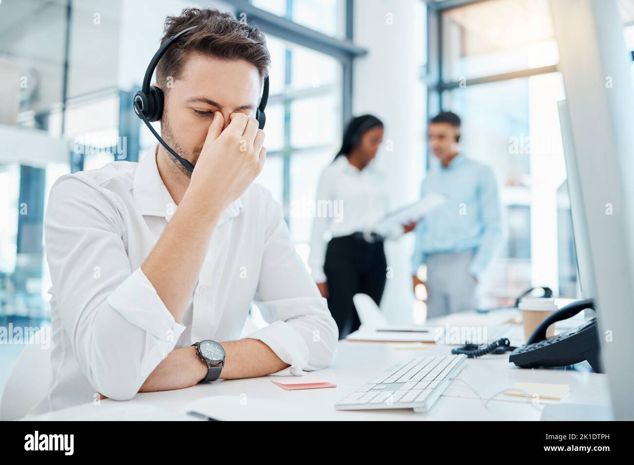 Call center, headache and burnout of a man in customer service or ...