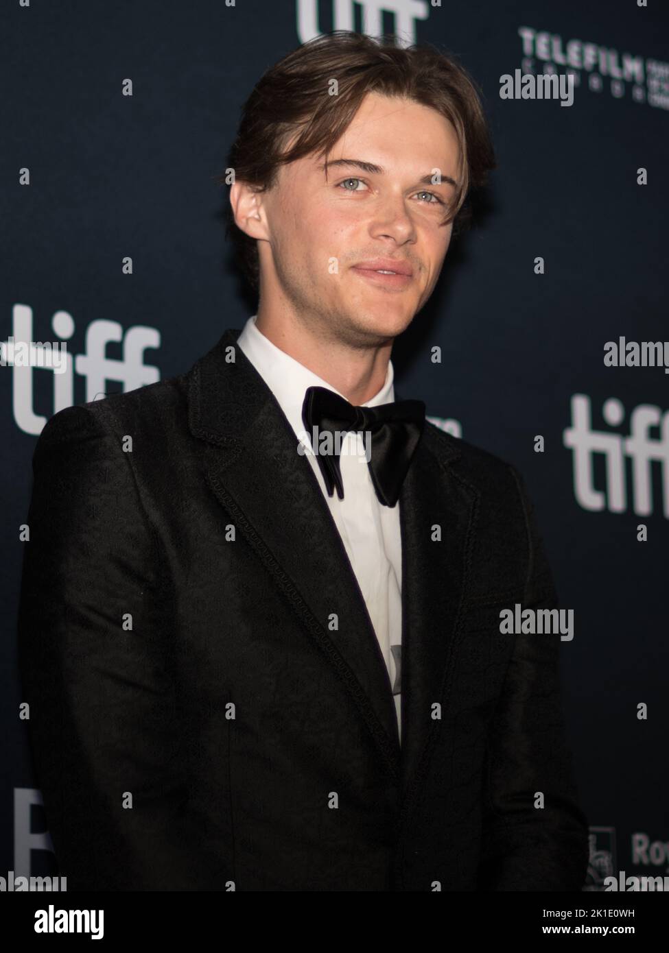 Actor Christopher Briney poses for a photograph on the red carpet premiere for the film ...