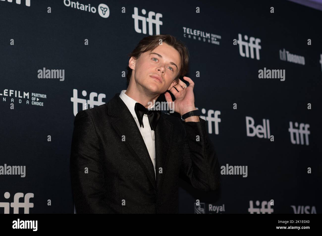 Actor Christopher Briney poses for a photograph on the red carpet ...