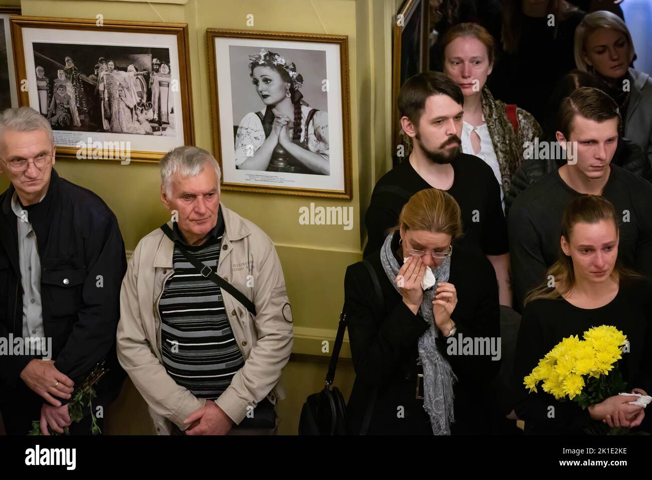 People attend a funeral ceremony for Ukrainian volunteer soldier and ...