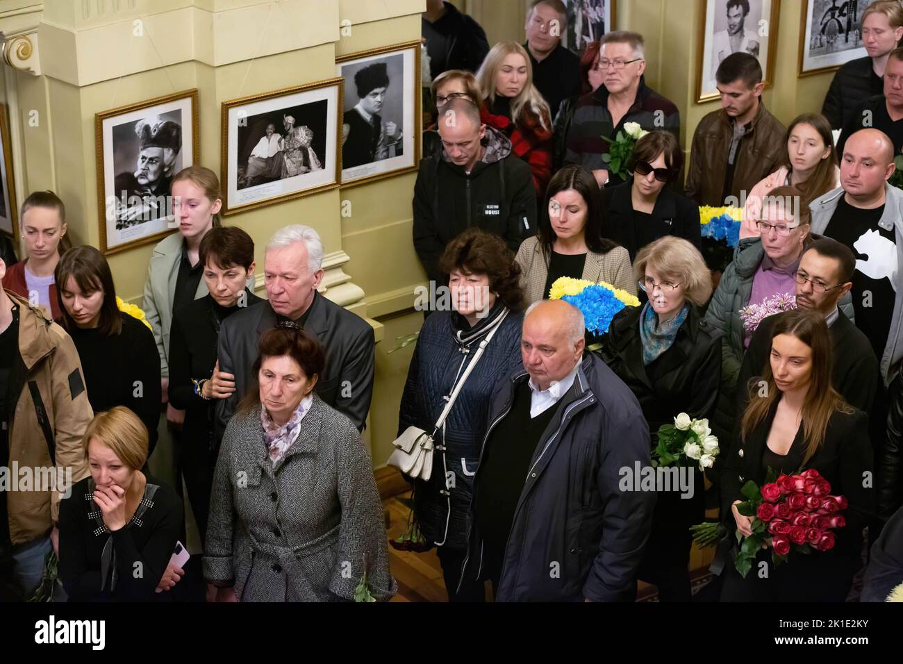 People attend a funeral ceremony for Ukrainian volunteer soldier and ...