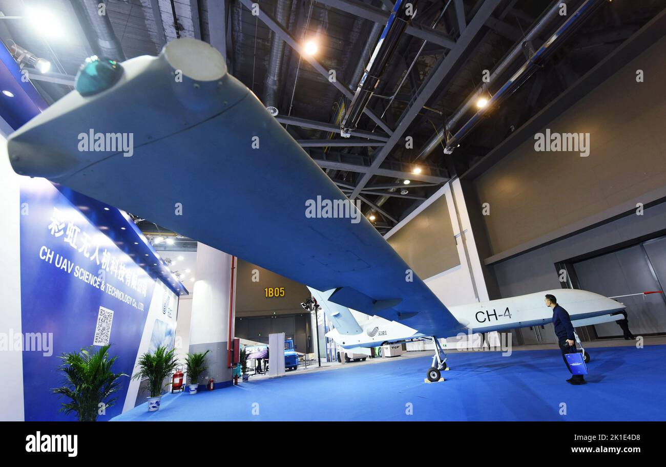 HANGZHOU, CHINA - DECEMBER 6, 2019 - Visitors view a CH-4 medium ...
