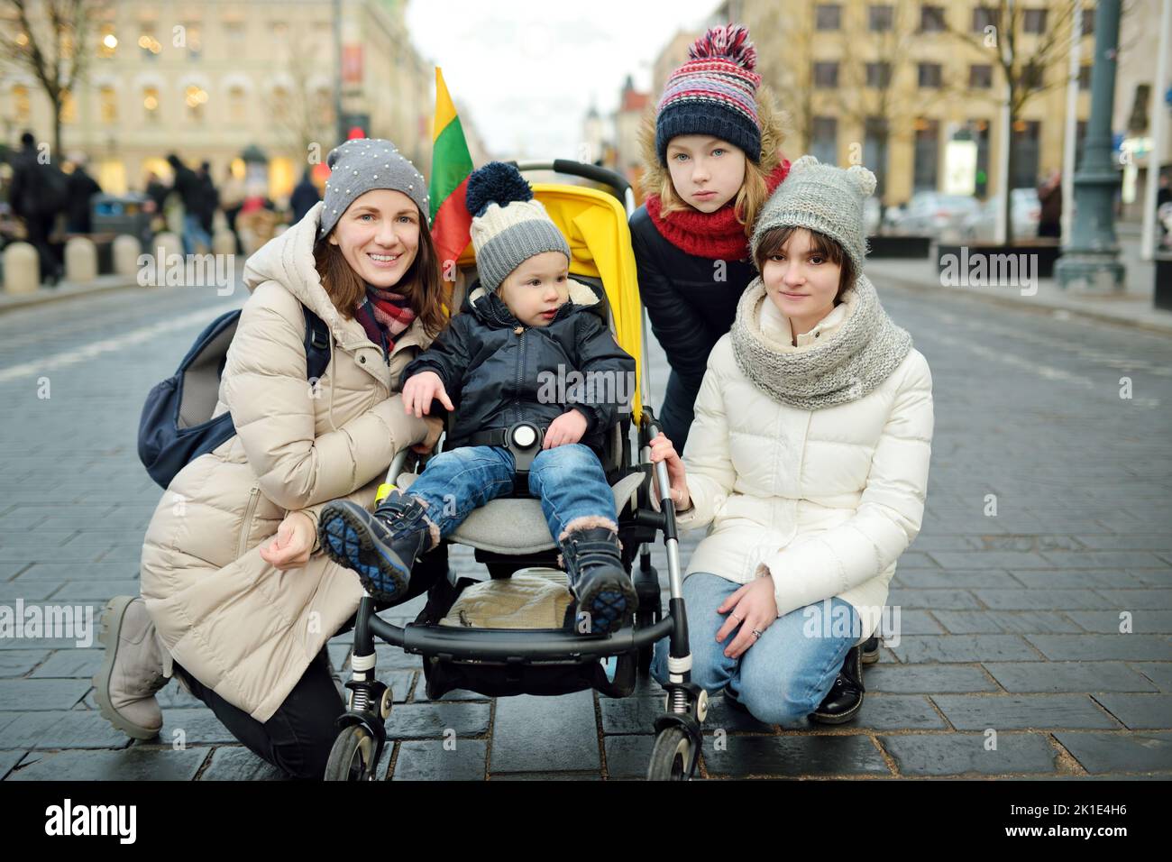 Young mother and her three children celebrating Lithuanian Independence ...