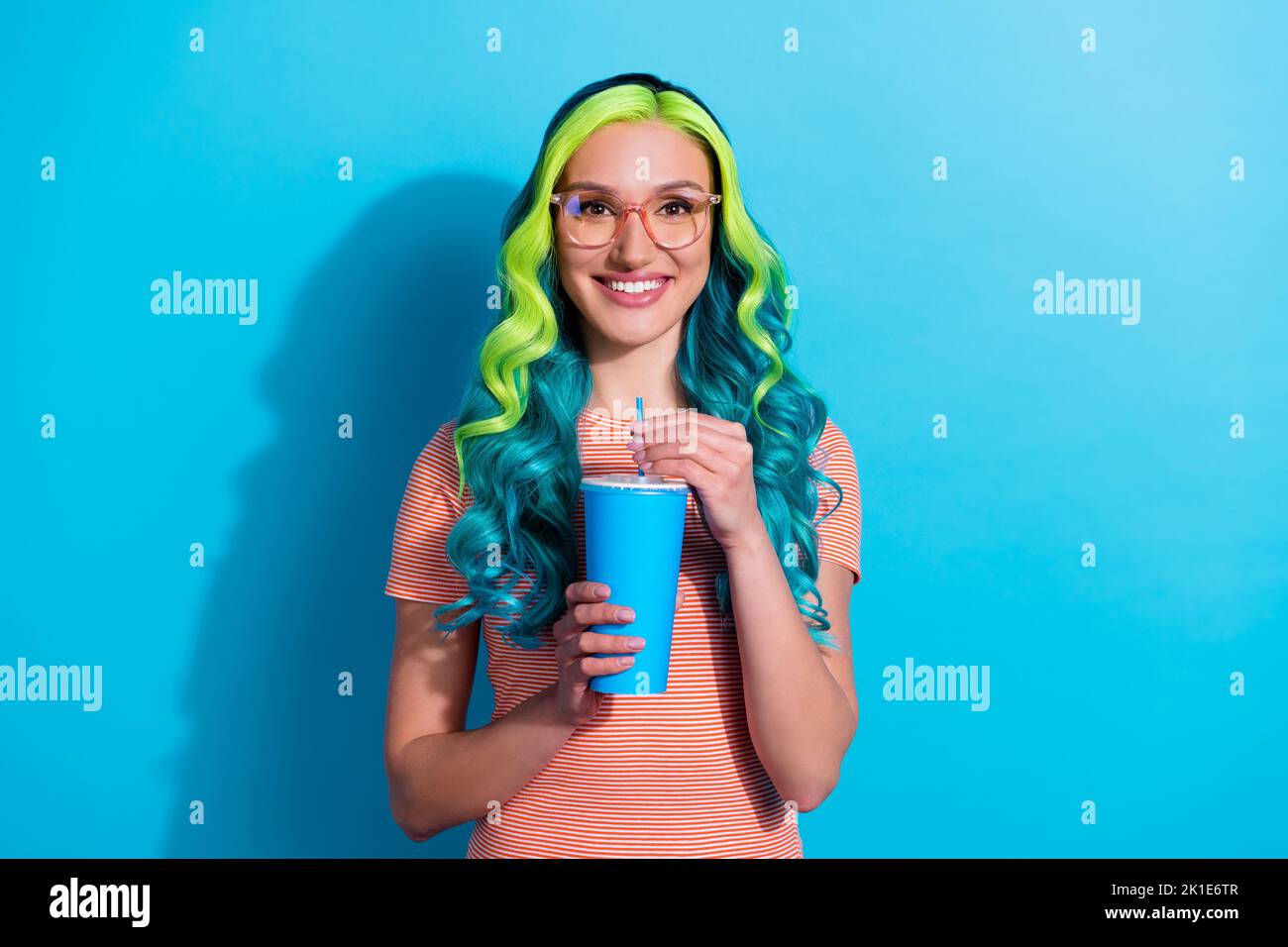 Photo of pretty good mood young female enjoy cold fizzy drink during ...
