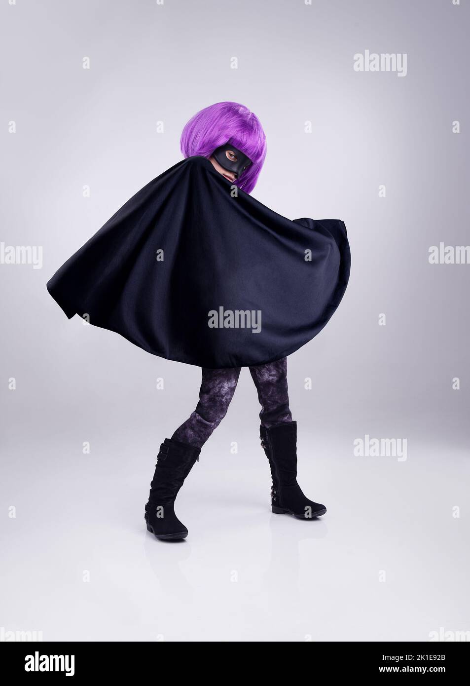 They call her the invisible purple. A studio shot of a confident little ...