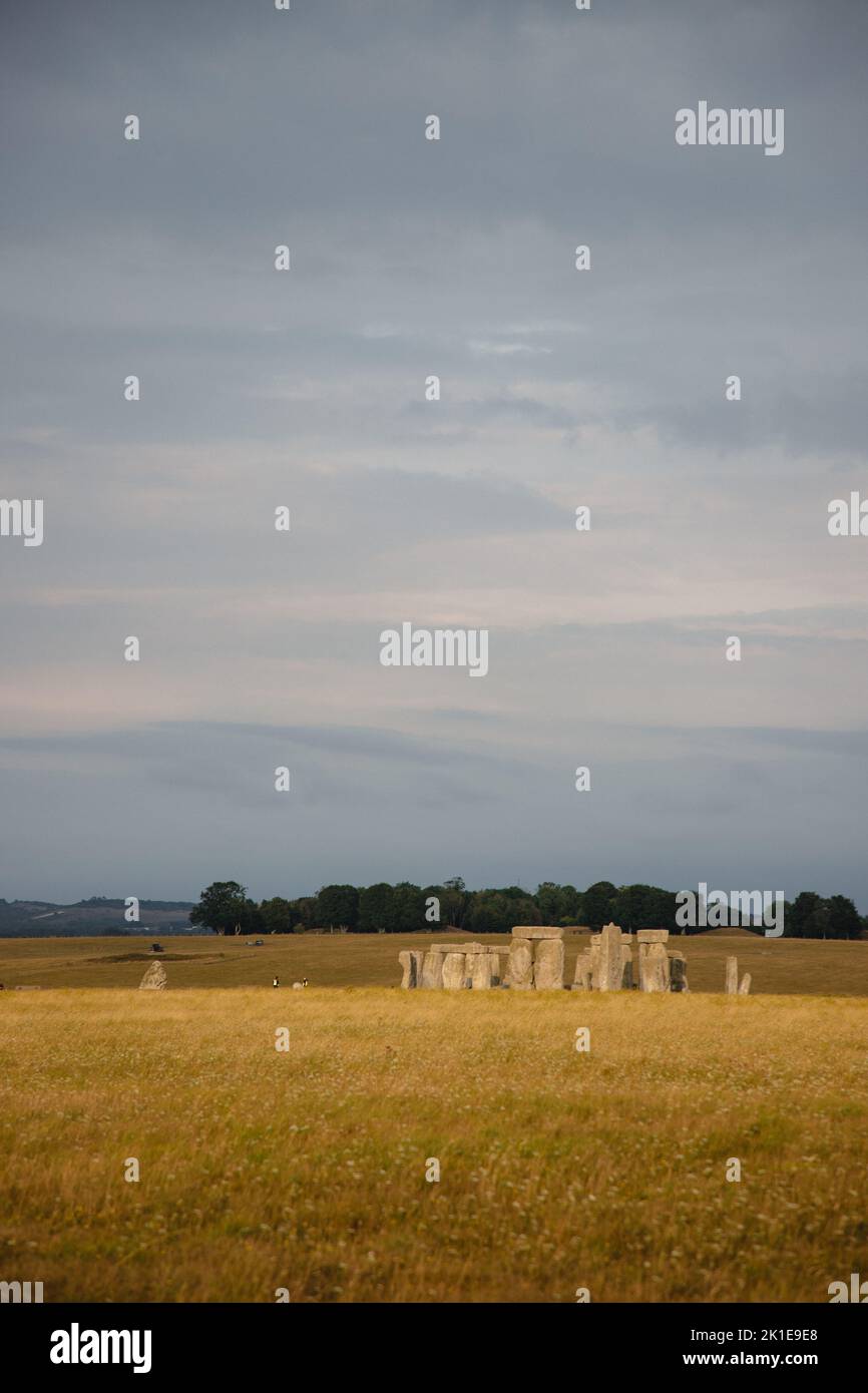 A vertical shot of the iconic prehistoric monument Stonehenge in ...
