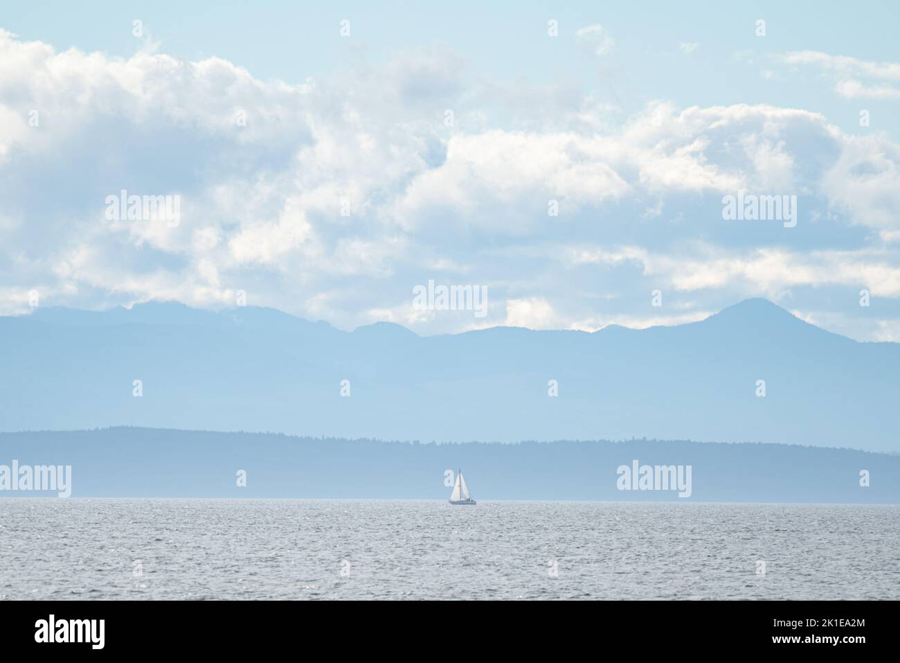 Distant sail boat hi-res stock photography and images - Alamy