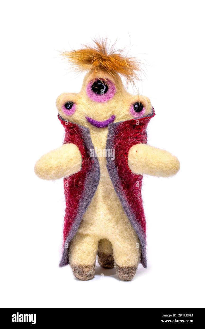 Fantastic creature soft toy made of natural wool Stock Photo - Alamy