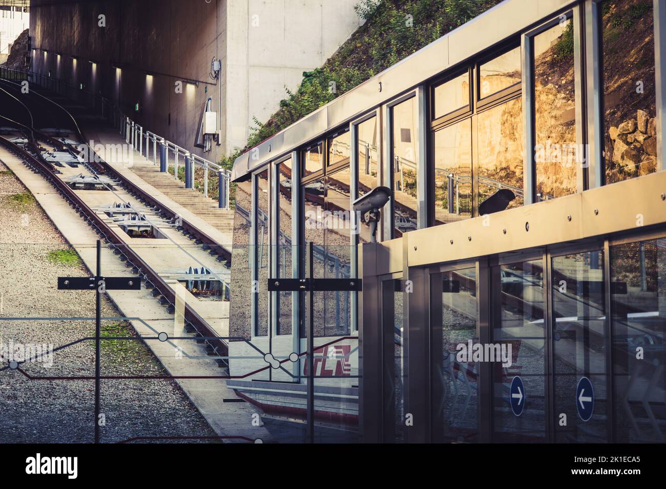 A train entering a railway tunnel Stock Photo - Alamy
