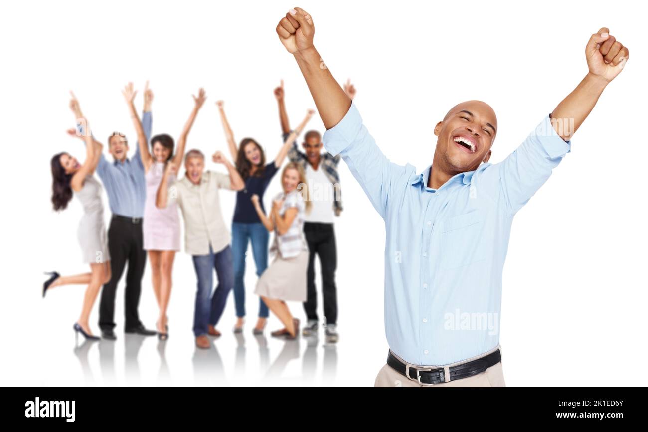 Celebrating a business triumph. Studio shot of an elated young man with ...