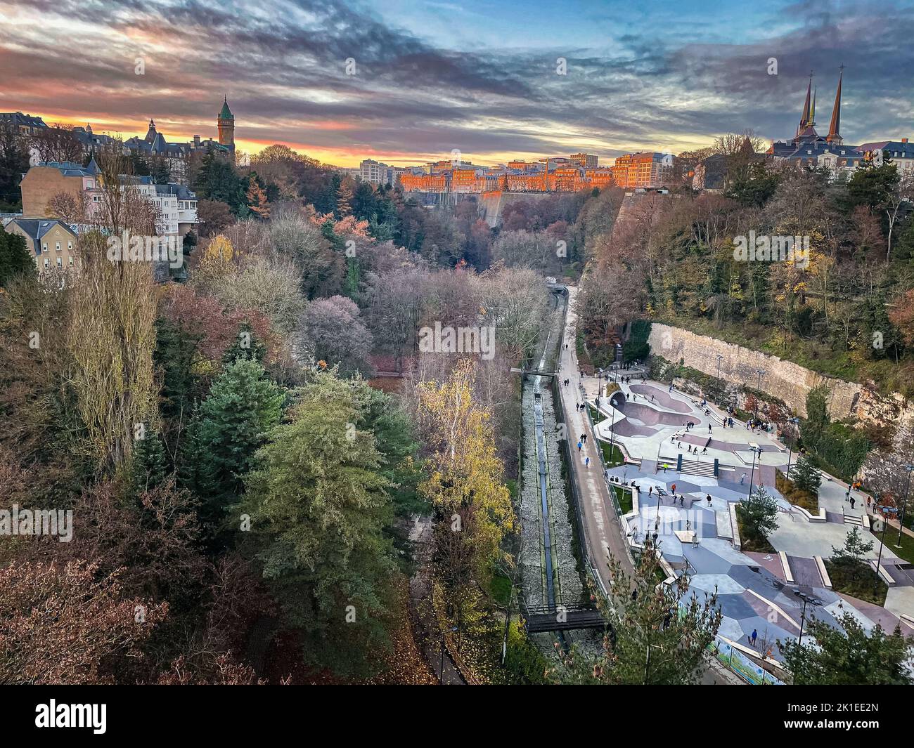 An aerial view of a park and forest landscape near a city in Luxembourg ...