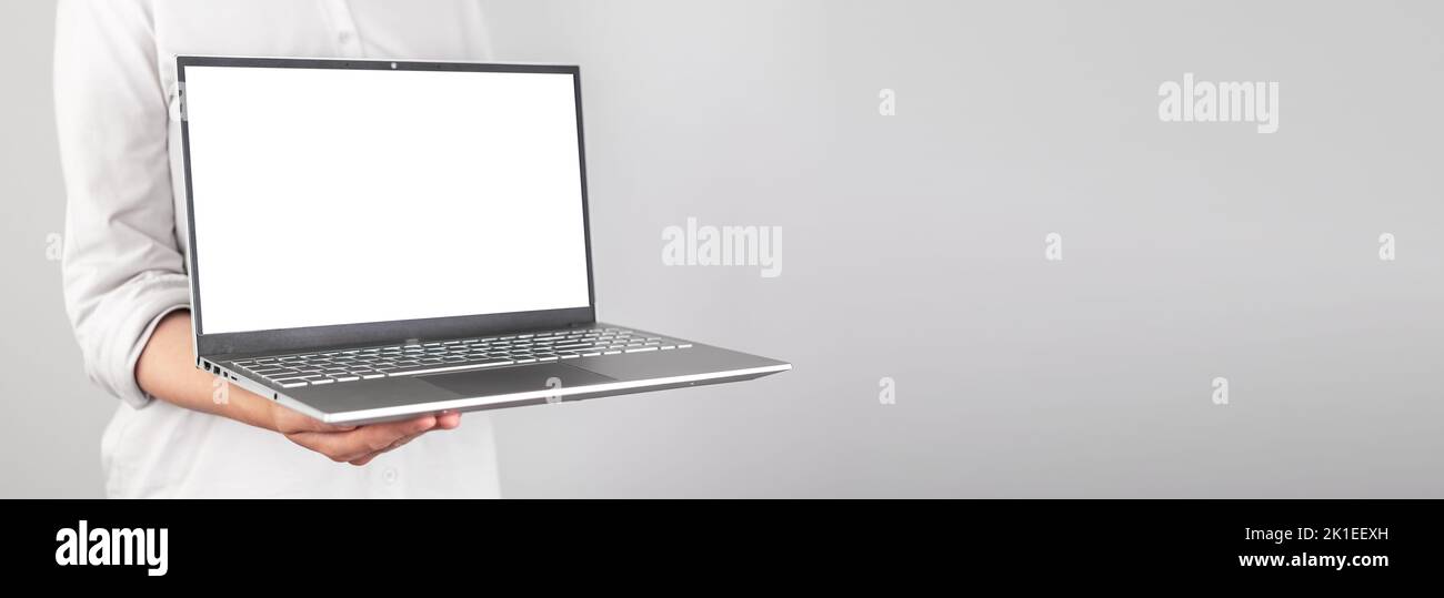 Banner with hands holding laptop mockup. Person showing presentation at ...