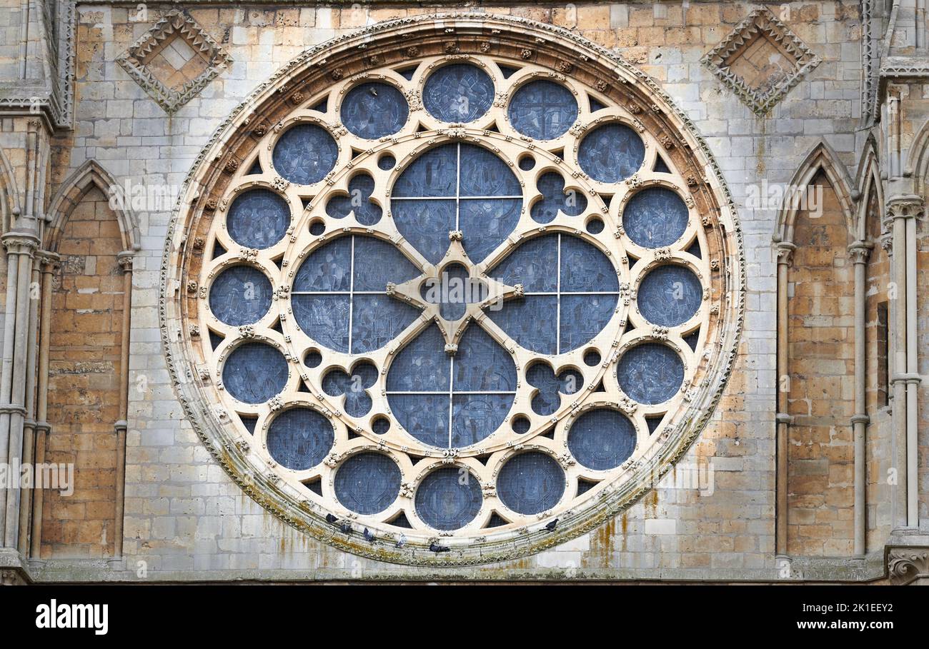 Outside of the circular stained glass rose window at the west end of ...