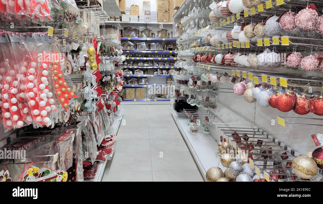 Christmas decorations and storefronts in the background at shopping ...
