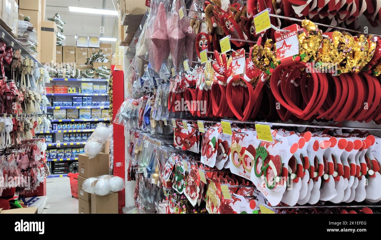 Christmas decorations and storefronts in the background at shopping ...