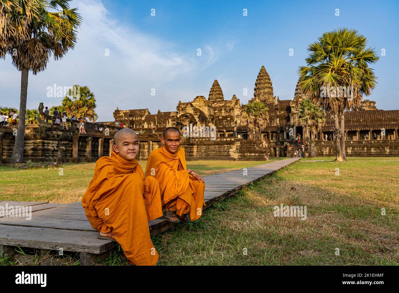 Cambodia. Siem Reap Province. Monks pose in front of the temple Angkor ...