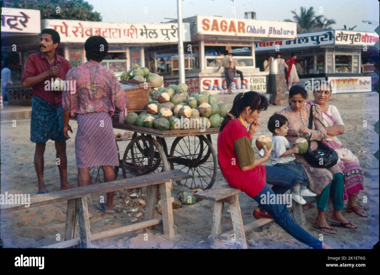 Nariyal Panni Walla, Juhu Beach Stock Photo - Alamy