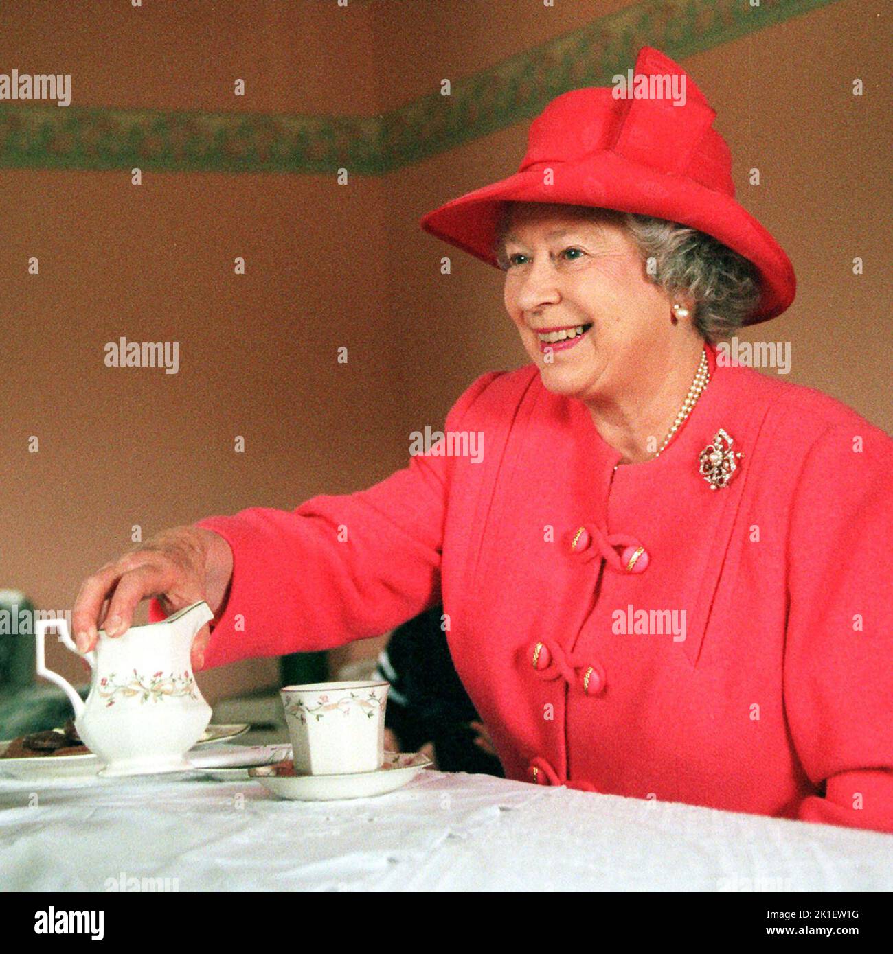 File photo dated 07/07/99 of Queen Elizabeth II joining Mrs Susan ...