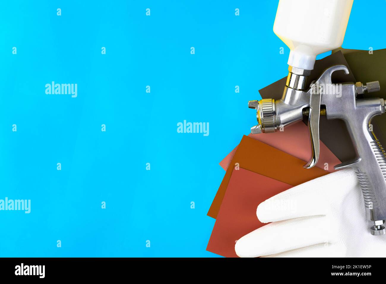 paint spray gun at work at the workplace in the workshop Stock Photo ...