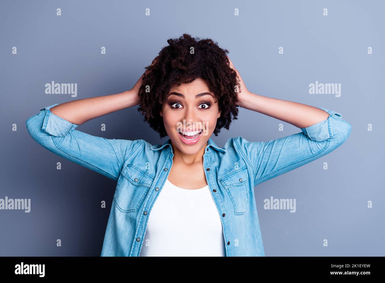 Photo of charming adorable woman rejoice satisfied new curly hairstyle ...