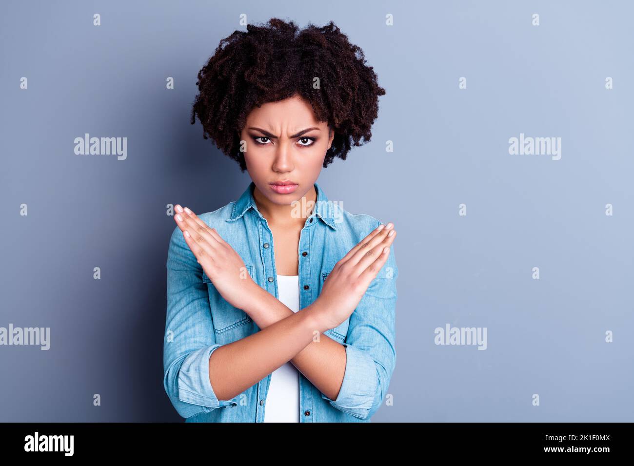 Photo of pretty angry girl crossed hands arms show no stop refuse ...