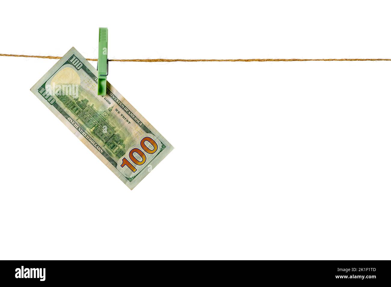 Money laundering. Dollar banknotes hanging on clothesline isolated on ...