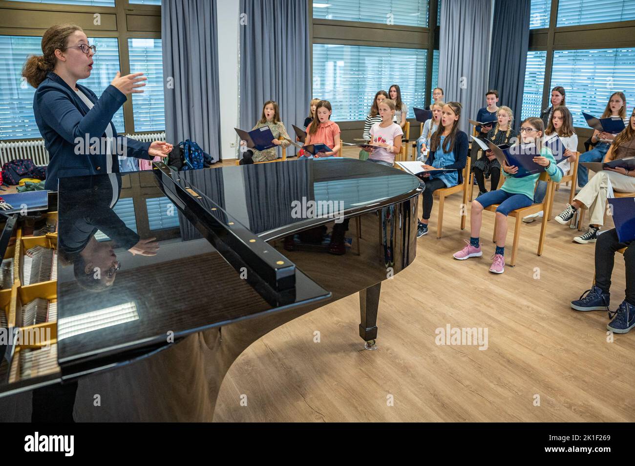 15 September 2022, Bavaria, Regensburg: The girls' choir sings in a ...
