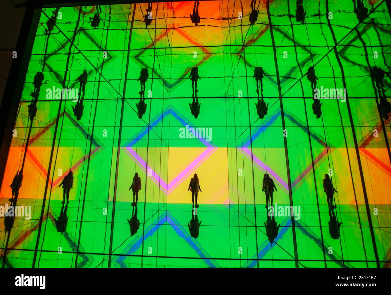 London UK 18 Sep. 2022 Members of staff pose with the installation INTO ...