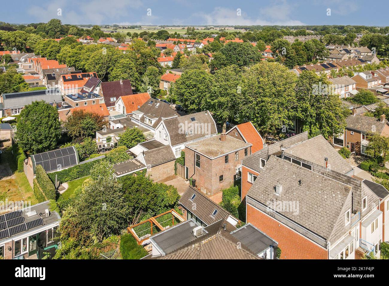 Panoramic view of high rise buildings and trees from height Stock Photo ...