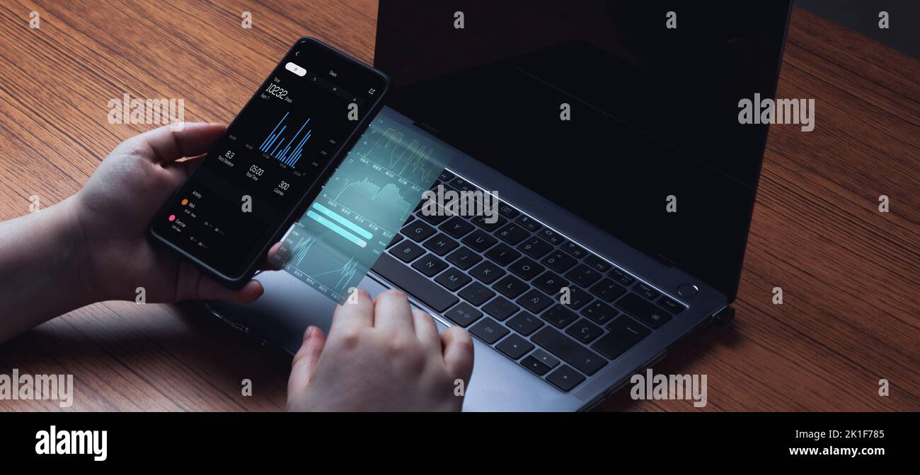 Banner of woman on desk checking on smartphone with VR screen interface ...