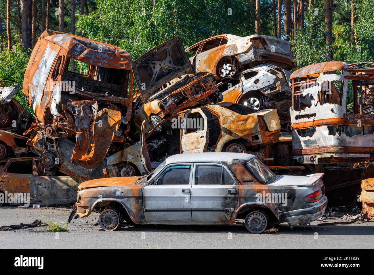 Skeletons of burned cars piled up after the expulsion of Russian ...