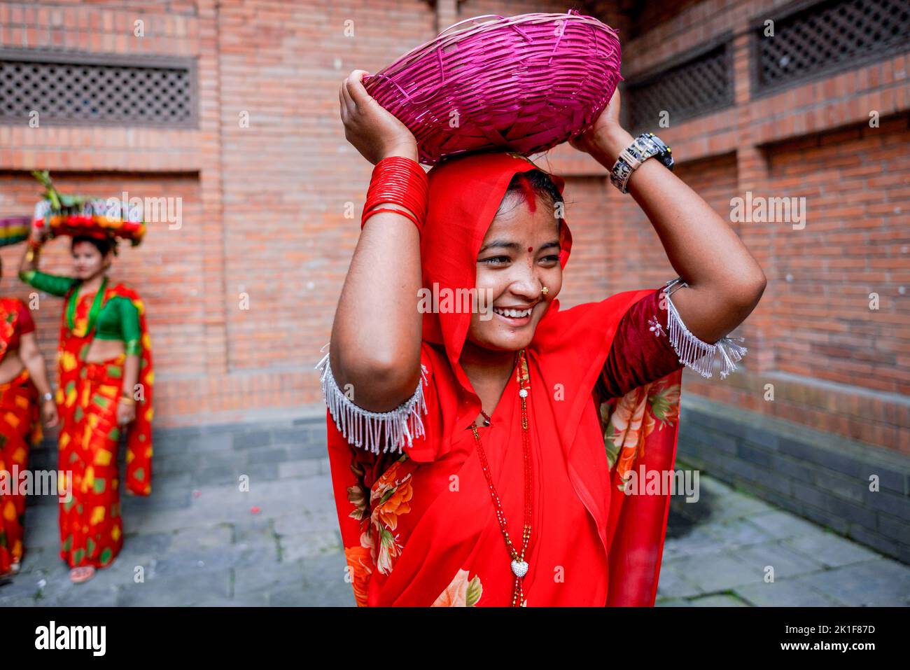 Kathmandu, Nepal. 18th Sep, 2022. Women from the Tharu community take ...