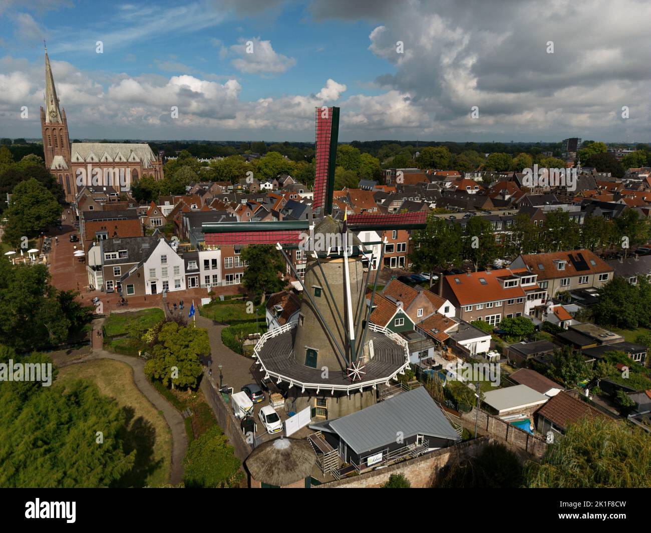 An aerial shot of a traditional Dutch windmill in an ancient town Stock ...