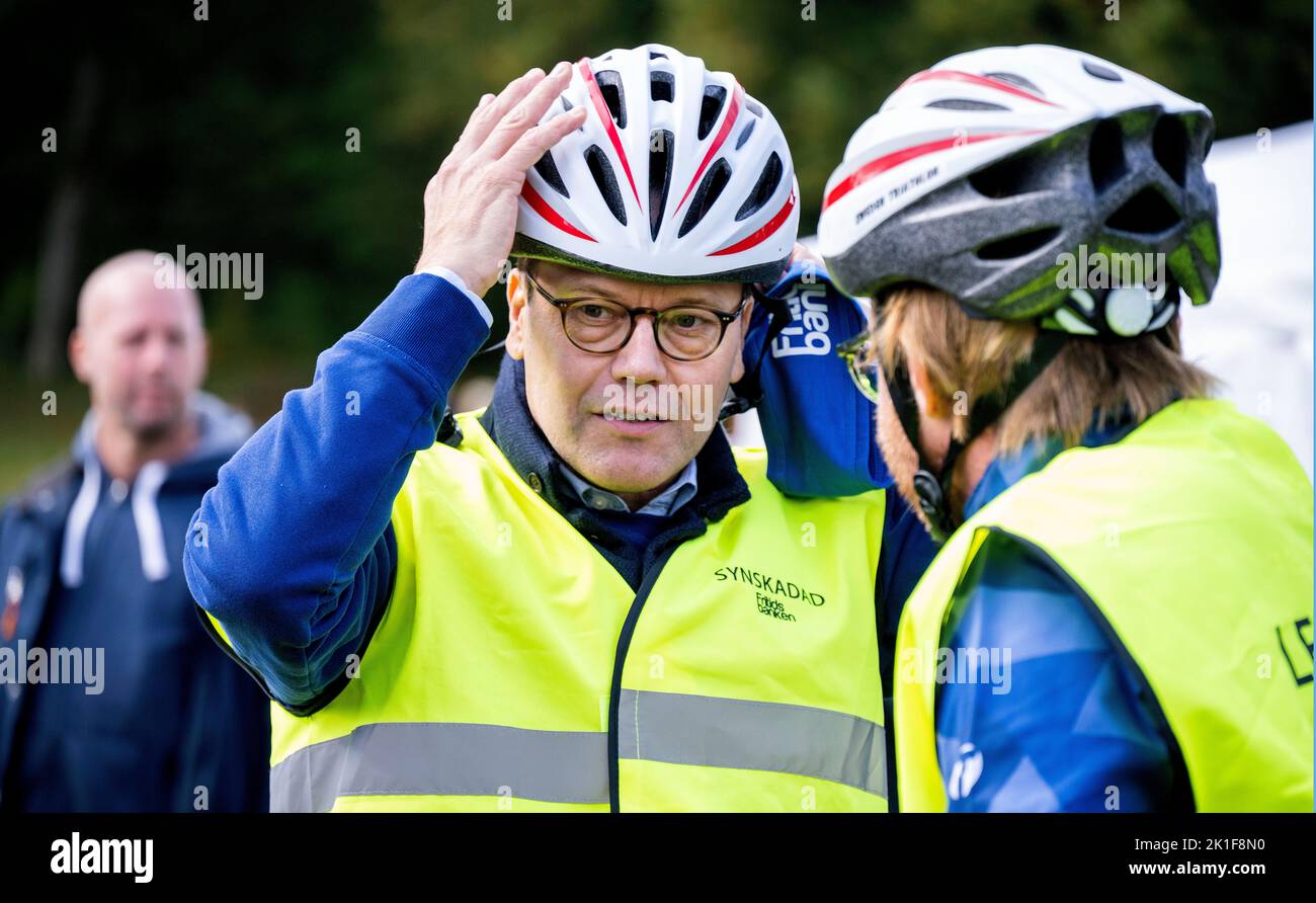 Prince Daniel rides a tandem bicycle while blindfolded during the Pep ...