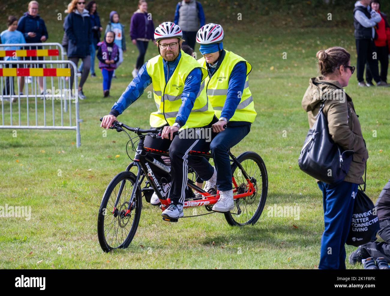 Prince Daniel rides a tandem bicycle while blindfolded during the Pep ...