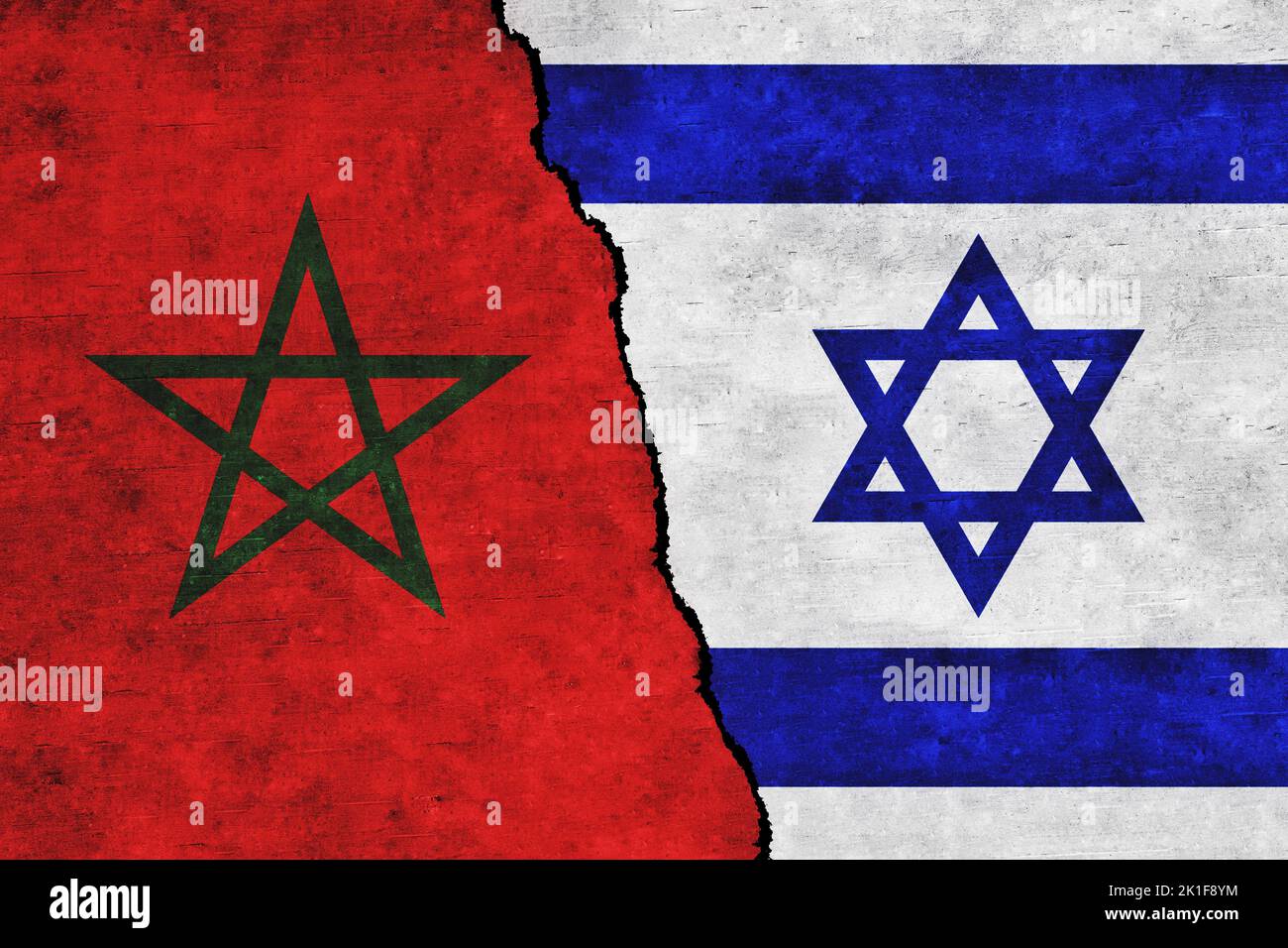 Israel and Morocco painted flags on a wall with a crack. Israel and ...
