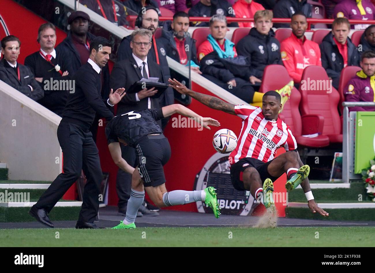 Brentford's Ivan Toney (right) and Arsenal's Kieran Tierney battle for ...