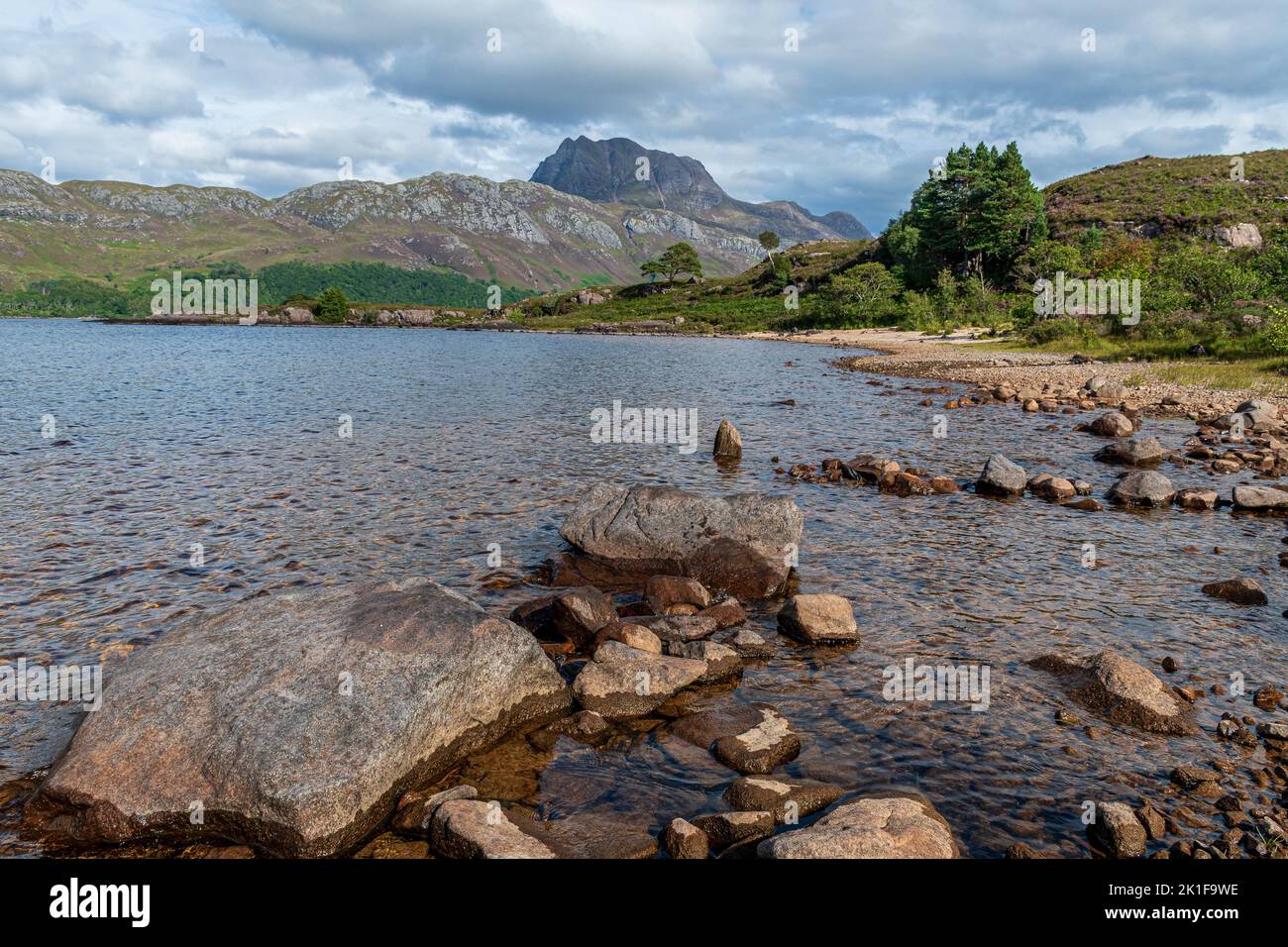 Slioch standing on the shore of Loch Maree, Scotland, United KIngdom ...