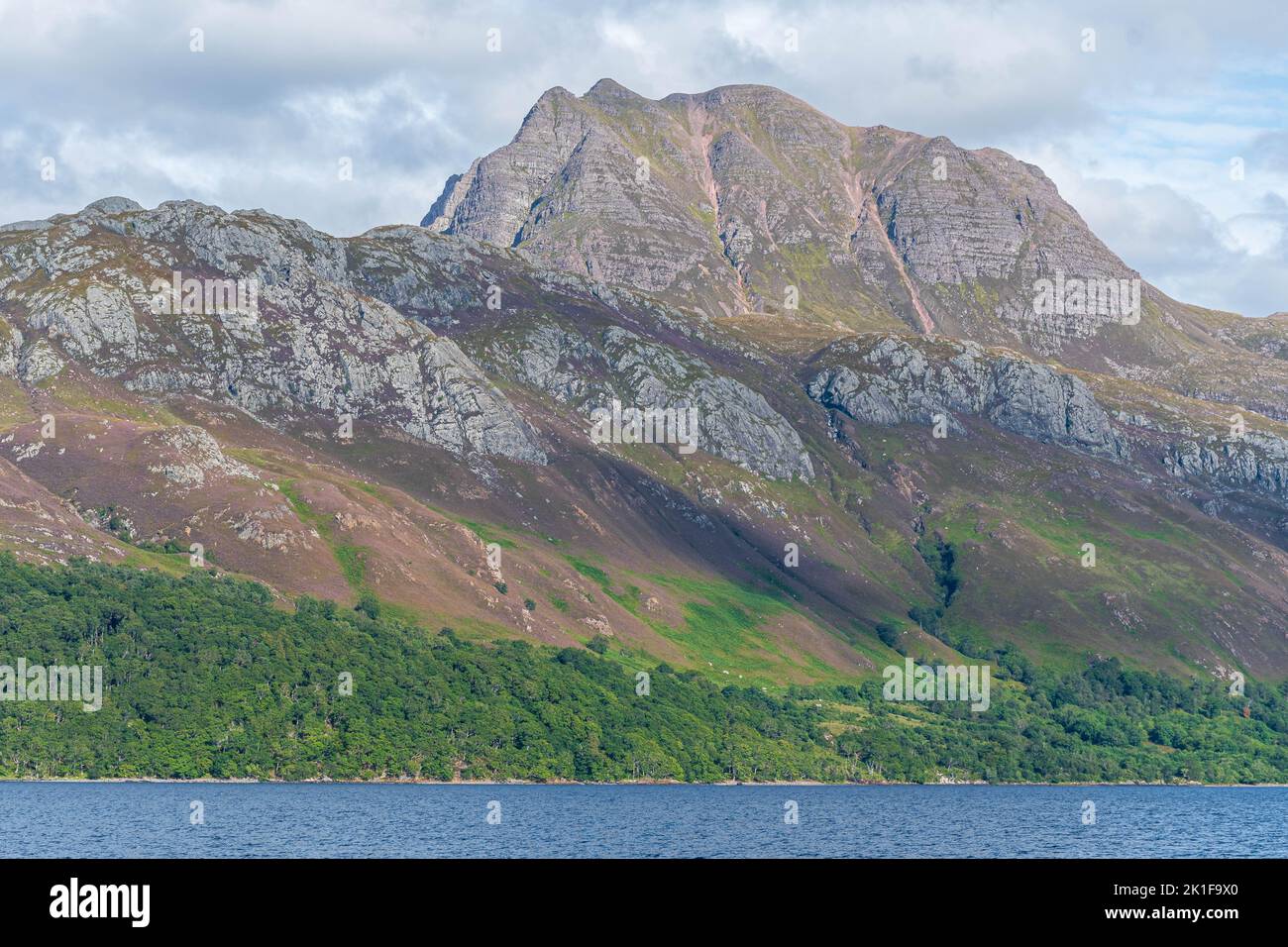 Slioch standing on the shore of Loch Maree, Scotland, United KIngdom ...