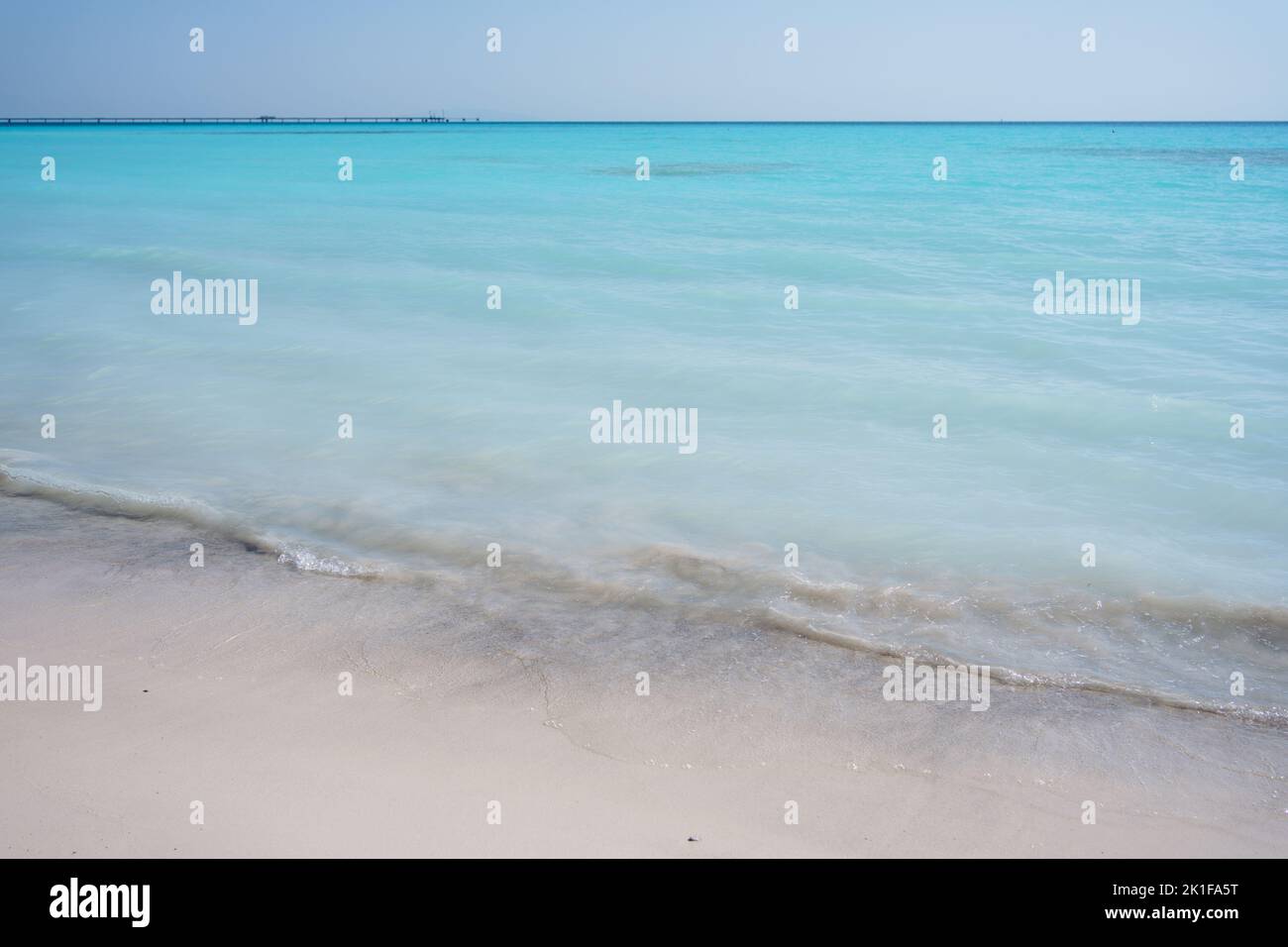 Tropical beach with turquoise ocean water Stock Photo - Alamy