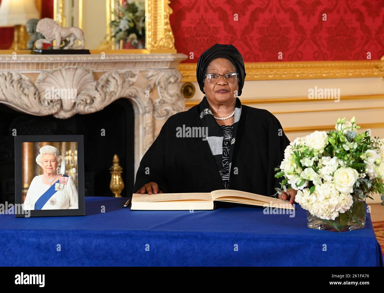 Former President of Malawi Joyce Banda signs a book of condolence at ...