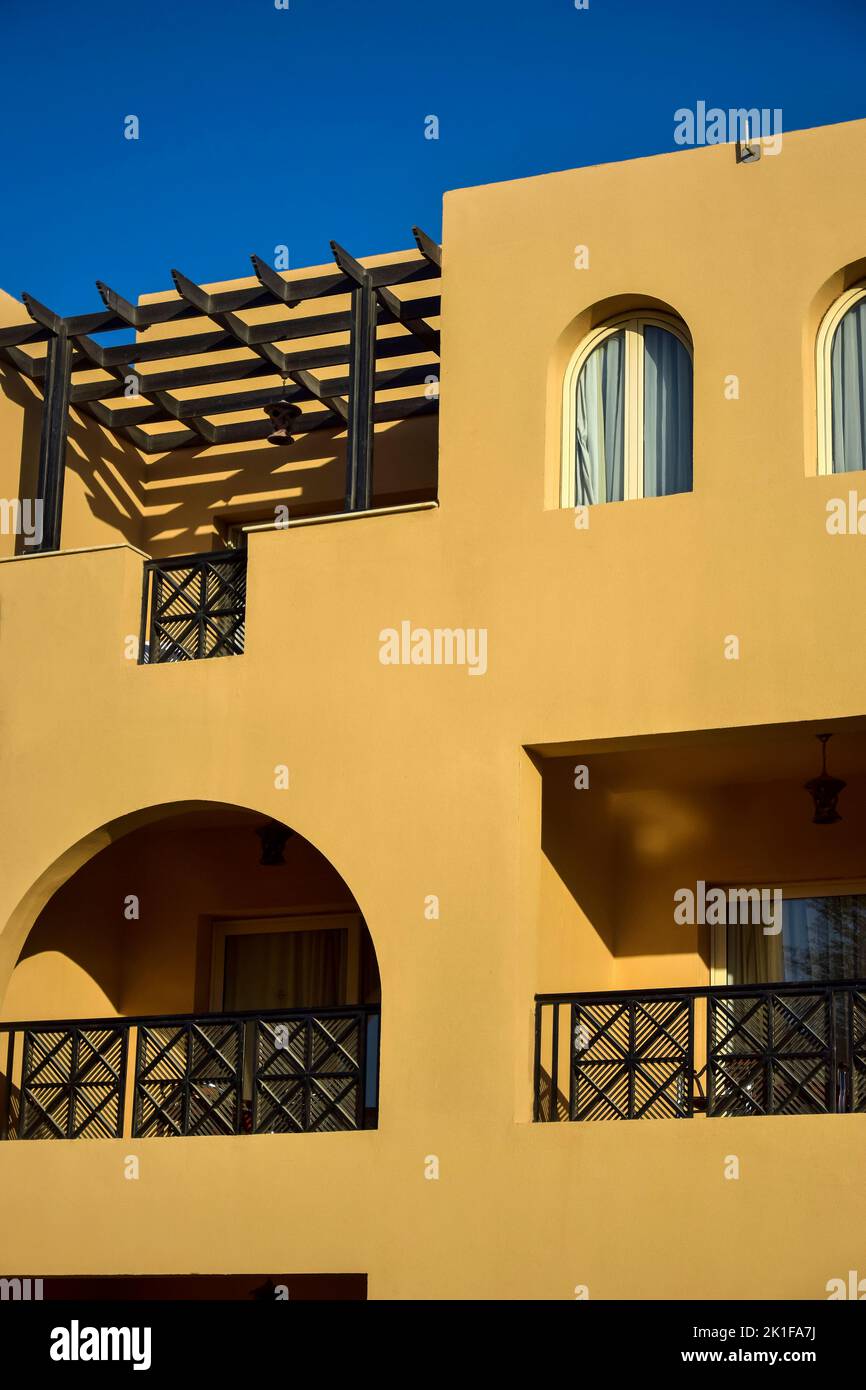 An arch windows in wall of arabic building. Egyptian house exterior ...