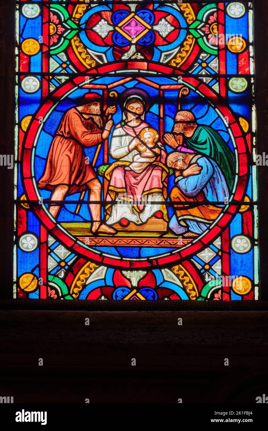 Three shepherds adore the newly born Jesus with his mother Mary, as ...