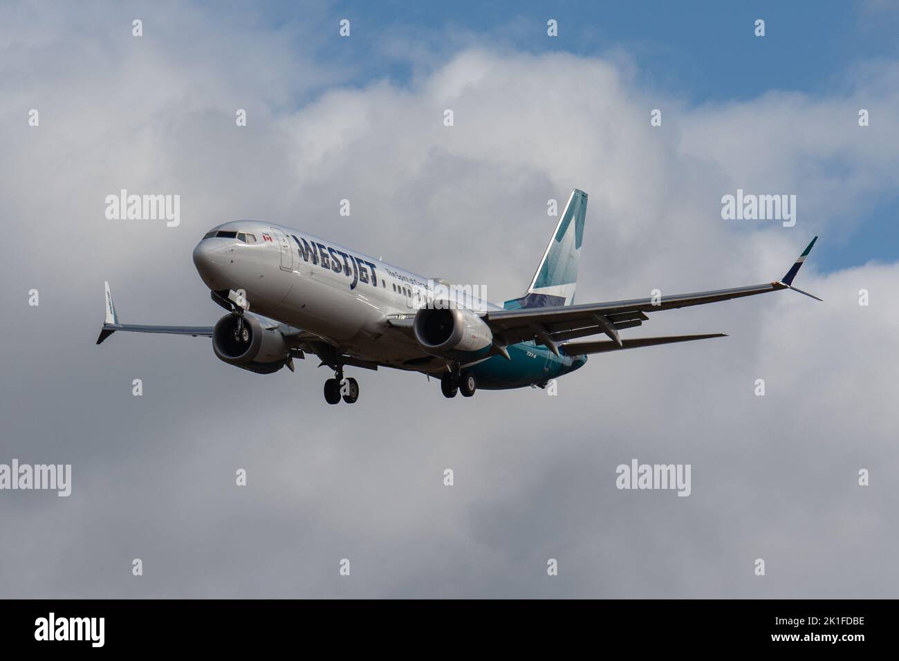 A closeup of a west jet plane departing at Edinburgh Airport, Scotland ...