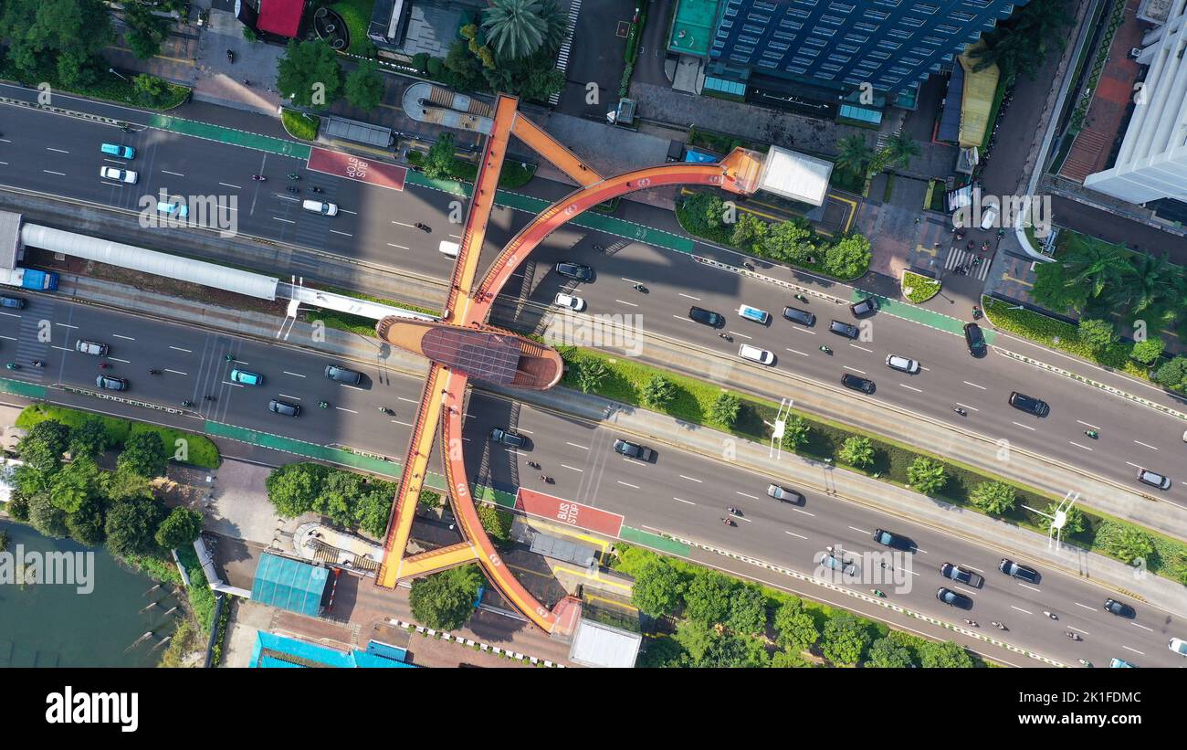 Top down view JPO Pinisi. Bridge crossing people Pinisi ship-shaped in Jakarta Stock Photo - Alamy