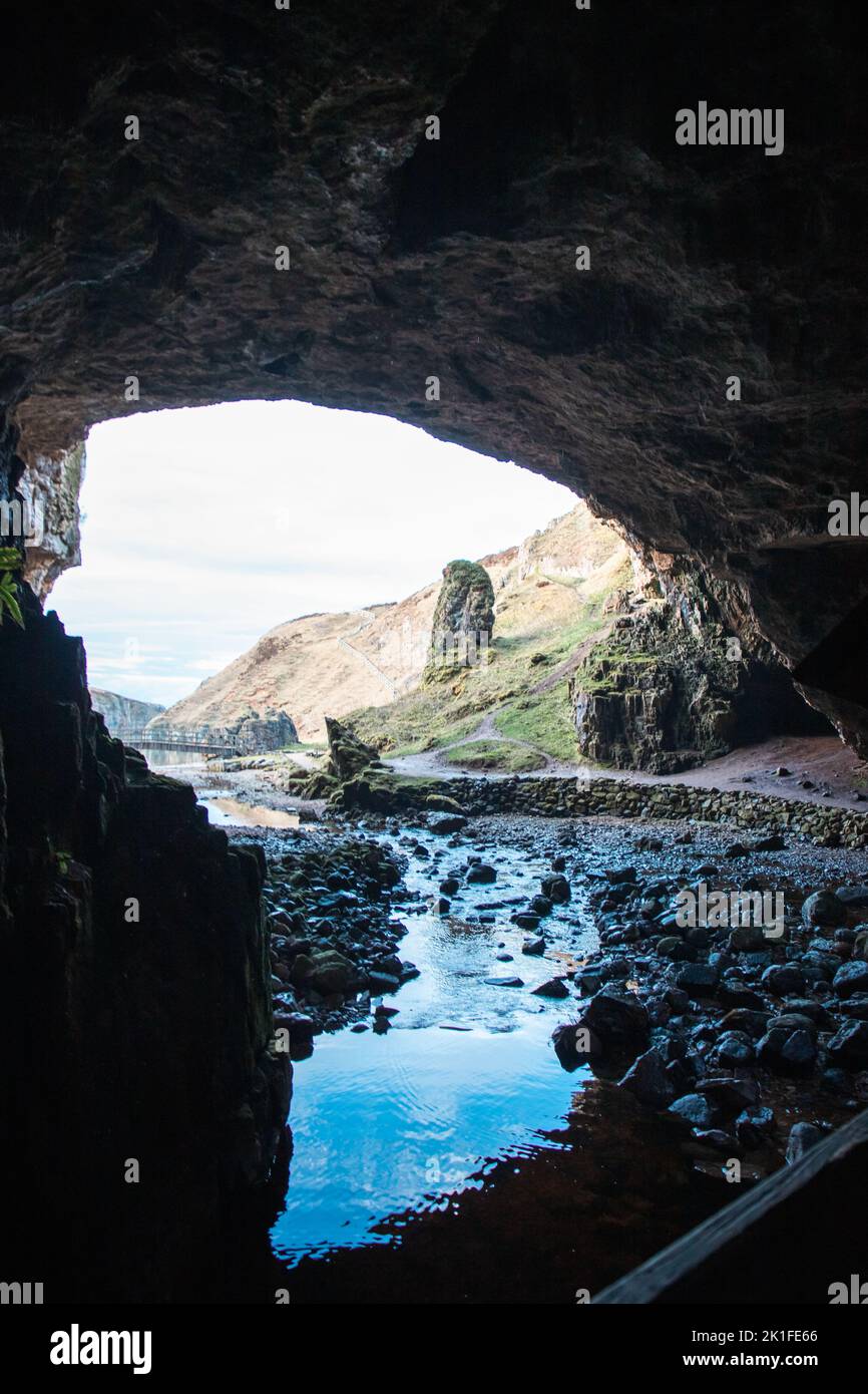 A scenic view of Smoo cave with combined sea cave and freshwater cave ...